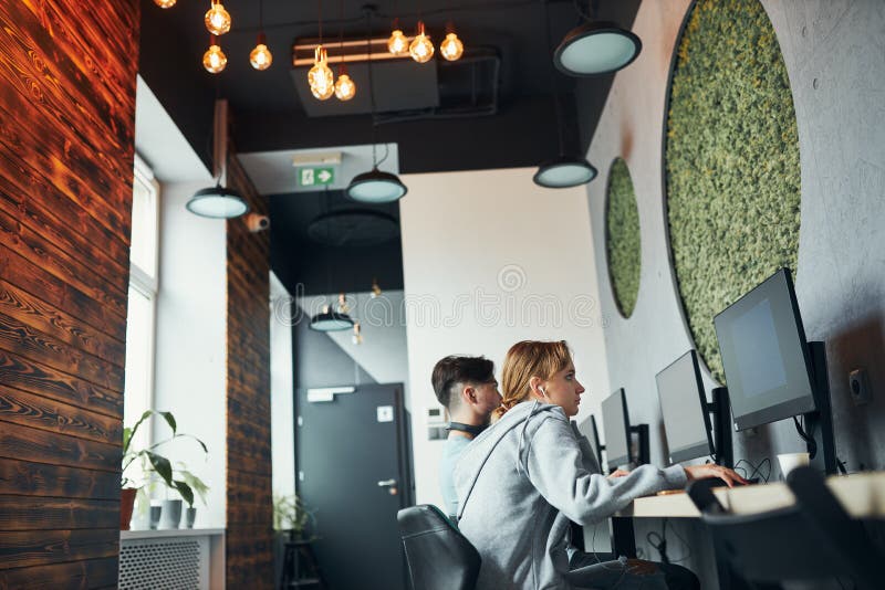 Students Learning in Computer Classroom. Young Man Preparing for Test ...