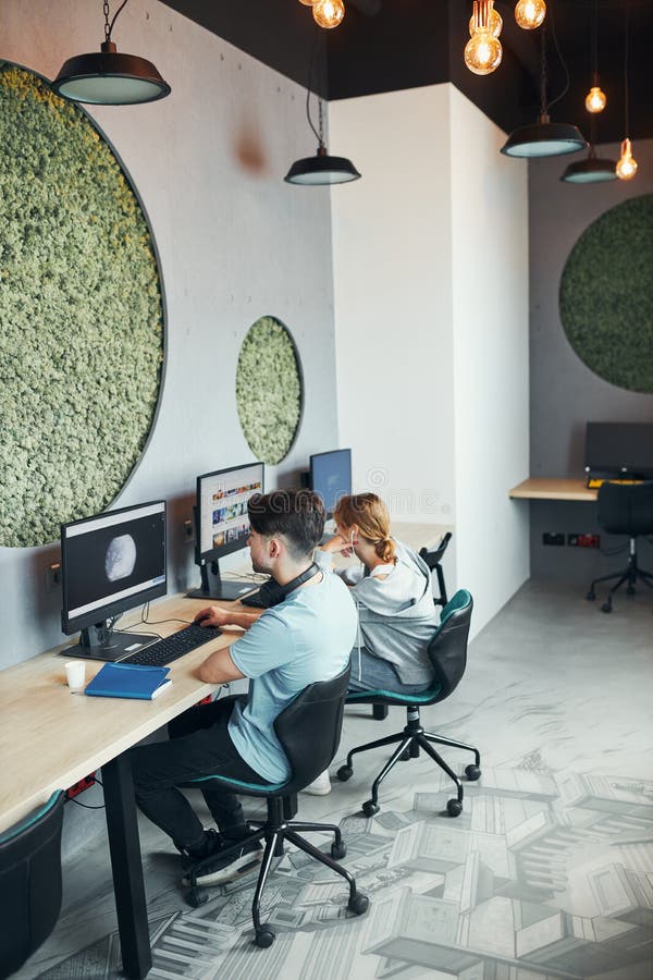 Students Learning in Computer Classroom. Young Man Preparing for Test ...