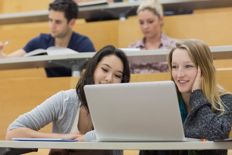 Students in a Lecture Hall with a Laptop Stock Image - Image of ...