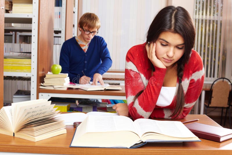 Schoolchildren Studying in School Library Stock Photo - Image of ...