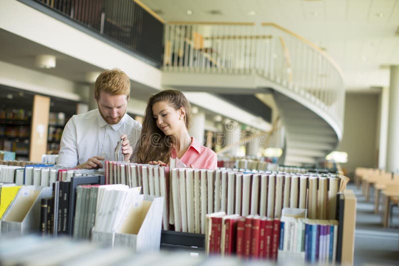 Students in the library stock image. Image of education - 58348297