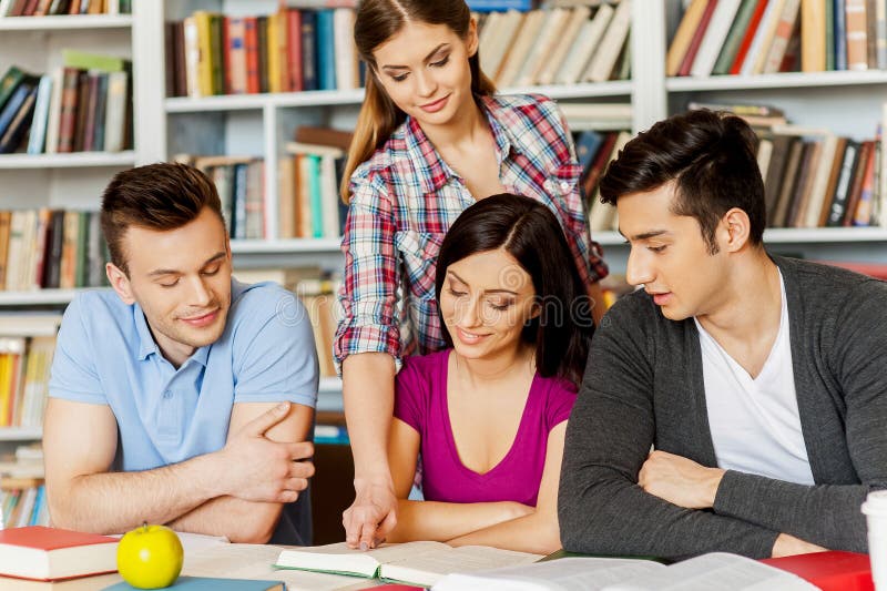 College Students Studying Together in a Library Stock Image - Image of ...
