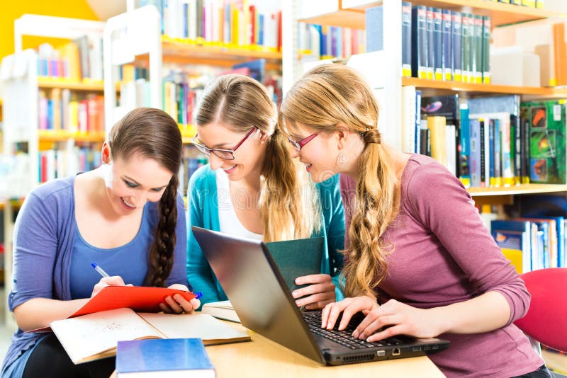 Students in Library are a Learning Group Stock Photo - Image of books ...