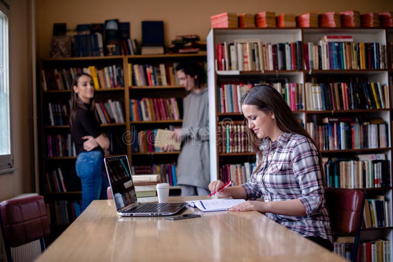 Students in library stock image. Image of caucasian - 111950081