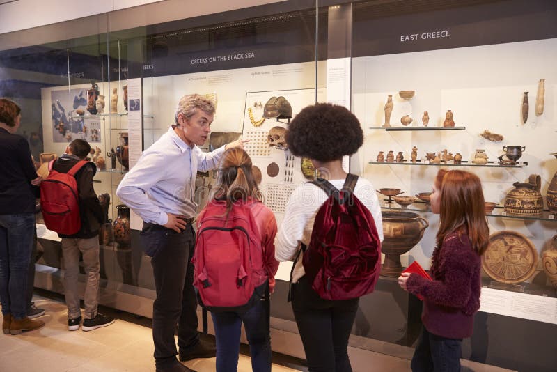 Students Looking at Artifacts in Case on Trip To Museum Editorial Photo ...