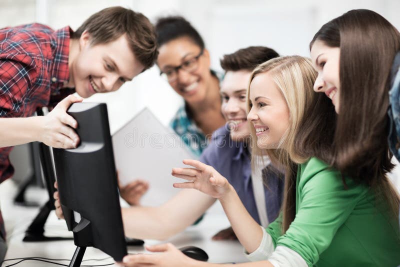 Students Looking at Computer Monitor at School Stock Image - Image of ...