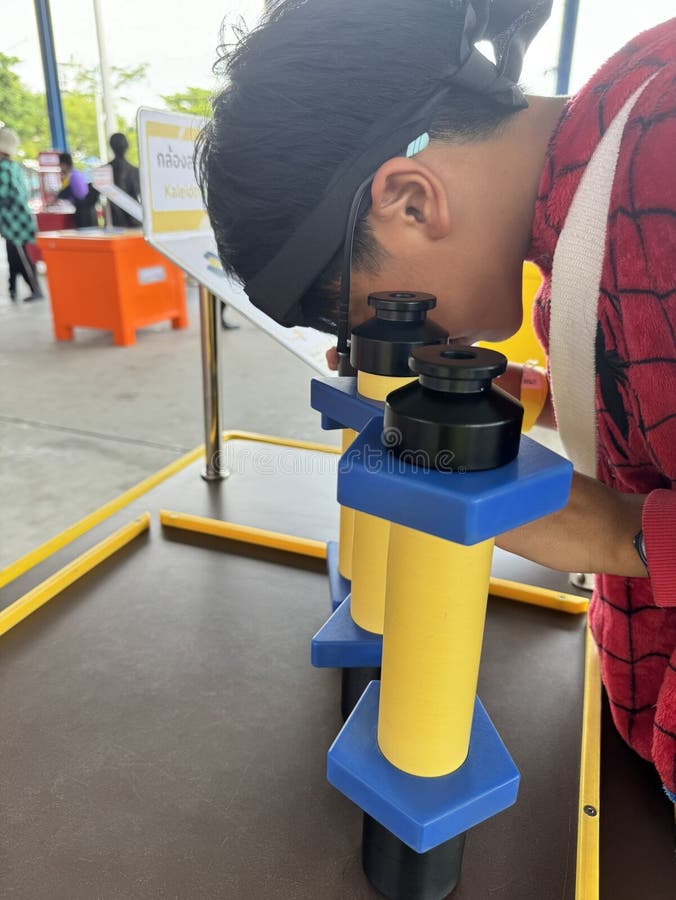 Students Looking at a Microscope Scientific Experiment Concept ...