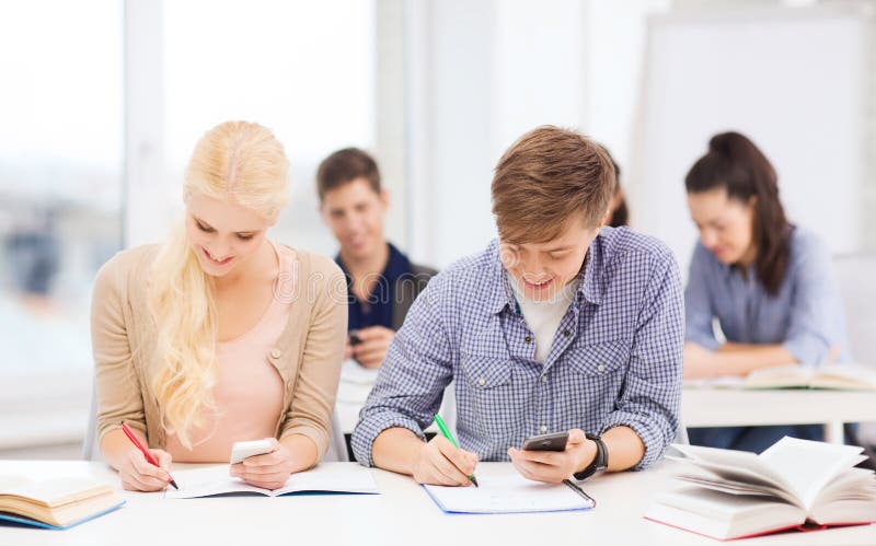 Students Looking into Smartphone at School Stock Photo - Image of ...