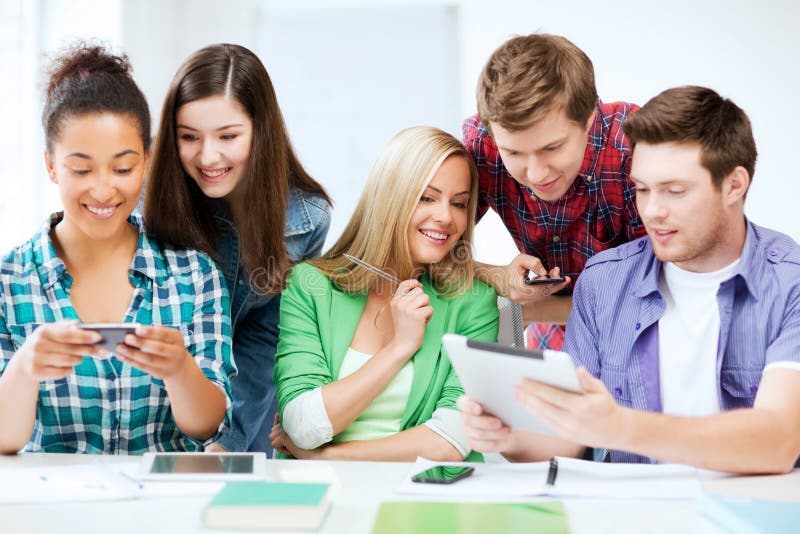 Students Looking at Smartphones and Tablet Pc Stock Photo - Image of ...