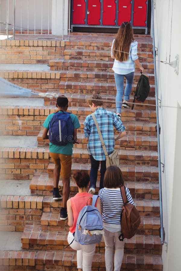 Students Moving Down Staircase Stock Photo - Image of classmate ...