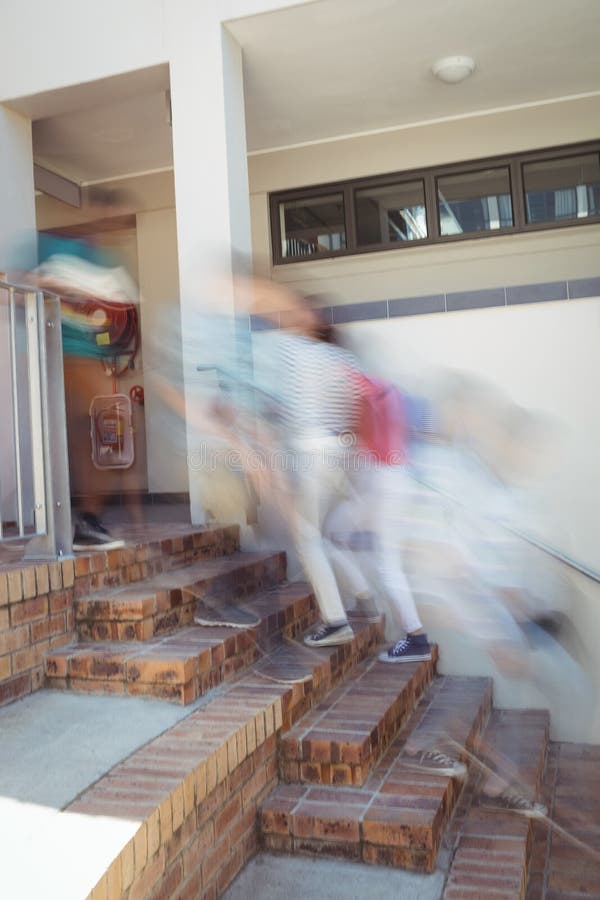 Students Moving Up Staircase at School Stock Photo - Image of clothing ...