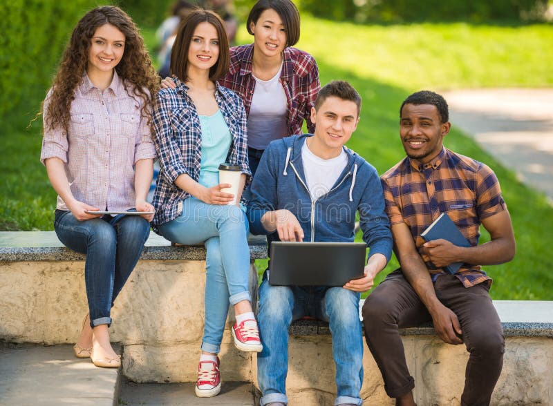 Students outdoors stock image. Image of education, friends - 53877605
