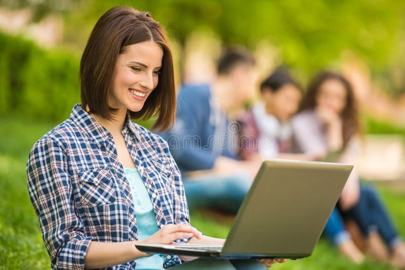 Students outdoors stock image. Image of holding, high - 53876859