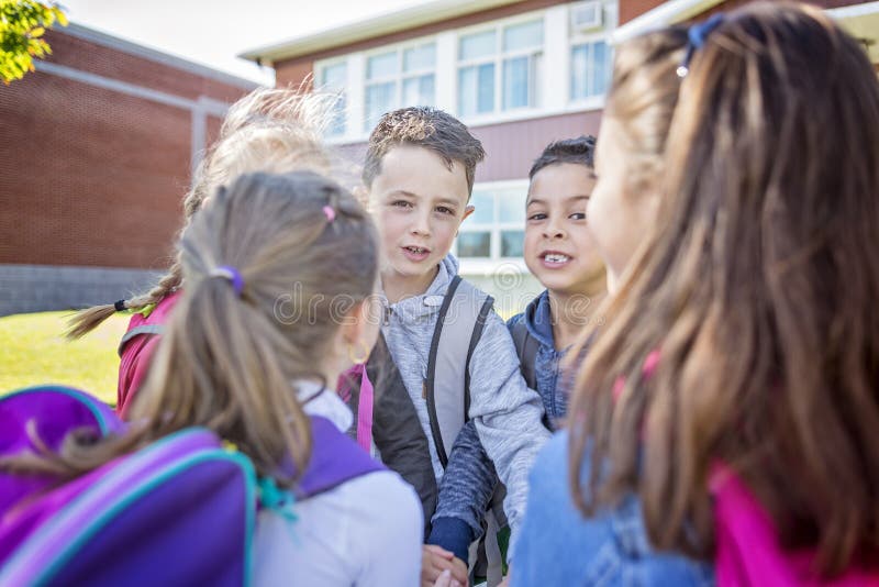 Students Outside School Standing Together Stock Photo - Image of ...