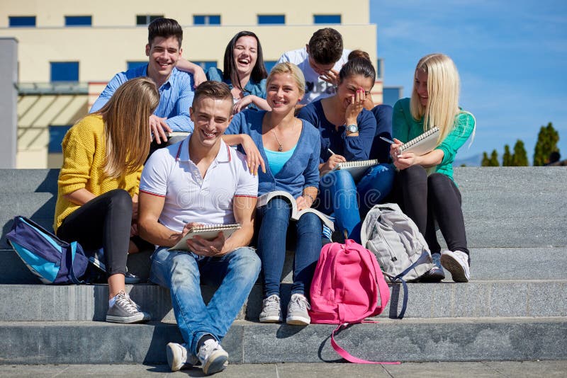 Students Outside Sitting on Steps Stock Photo - Image of life, friends ...
