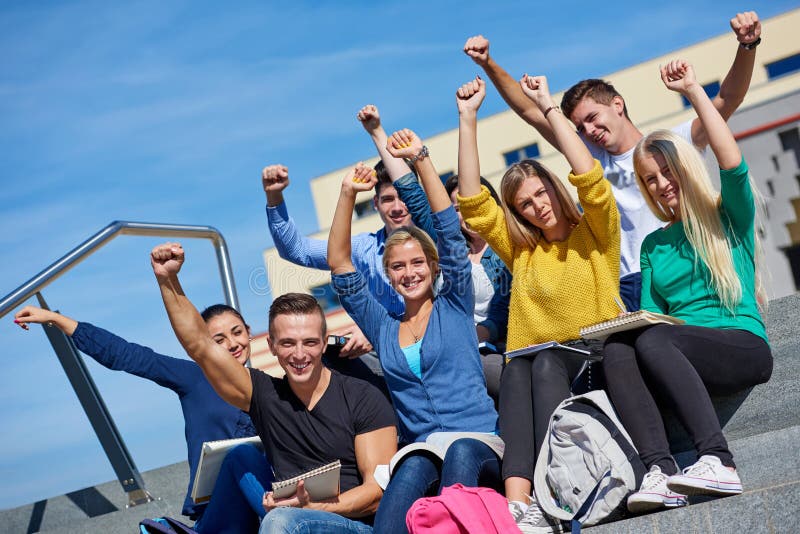 Students Outside Sitting on Steps Stock Photo - Image of laptop, campus ...