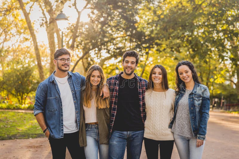 Students in the park stock image. Image of standing - 174423725