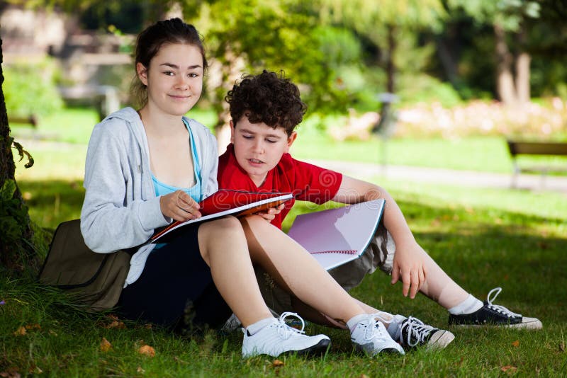 Students in park stock image. Image of schoolkids, reading - 38198209