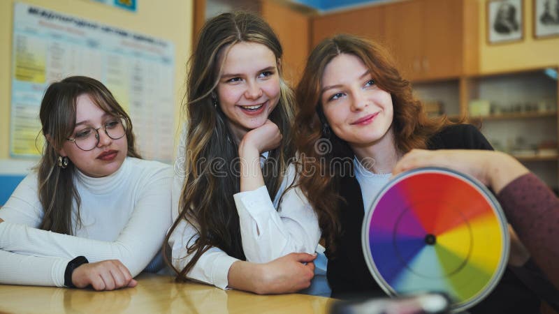 Students in Physics Class Spin Newton S Colorful Wheel. Stock Photo ...