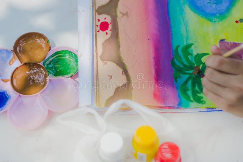 Students Practice Painting The Scenery By Using Poster Colors. Stock ...