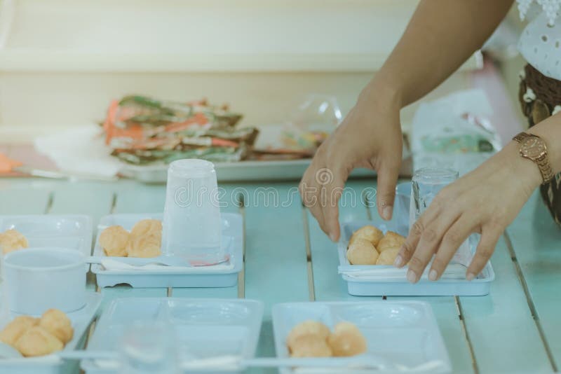 Students Prepare Snack and Beverage Stock Photo - Image of hands, group ...