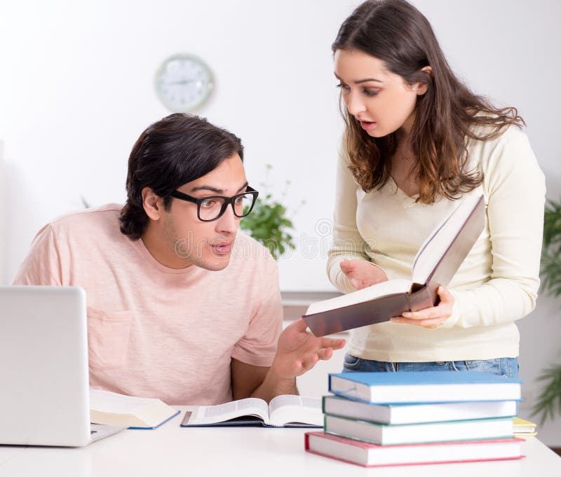 Students Preparing for Exam Together at Home Stock Image - Image of ...
