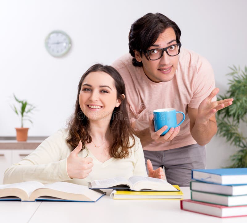 Students Preparing for Exam Together at Home Stock Image - Image of ...