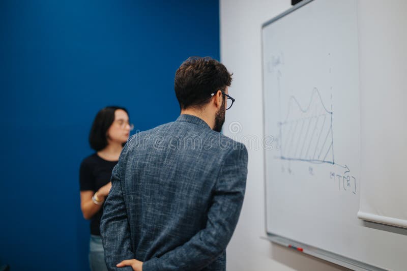 Students Present Graph at School Using Whiteboard Stock Photo - Image ...