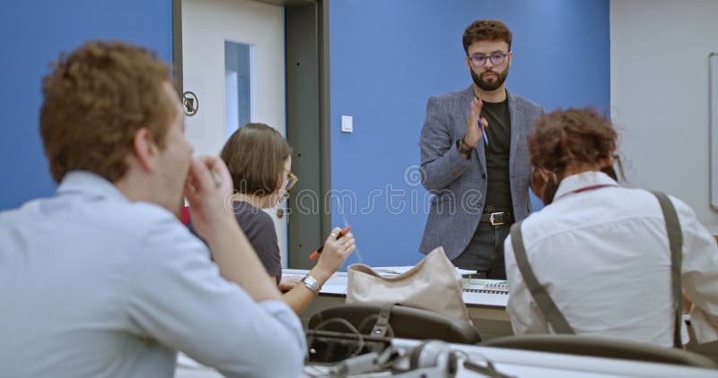 Students and Professor in Classroom during Exam or Individual Task Work ...