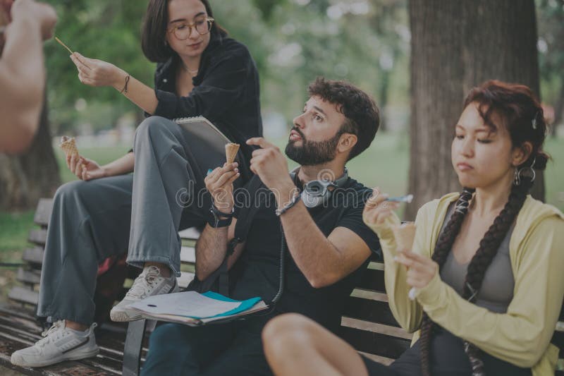 Students and Professor Enjoying Ice Cream Break Outdoors after Class ...