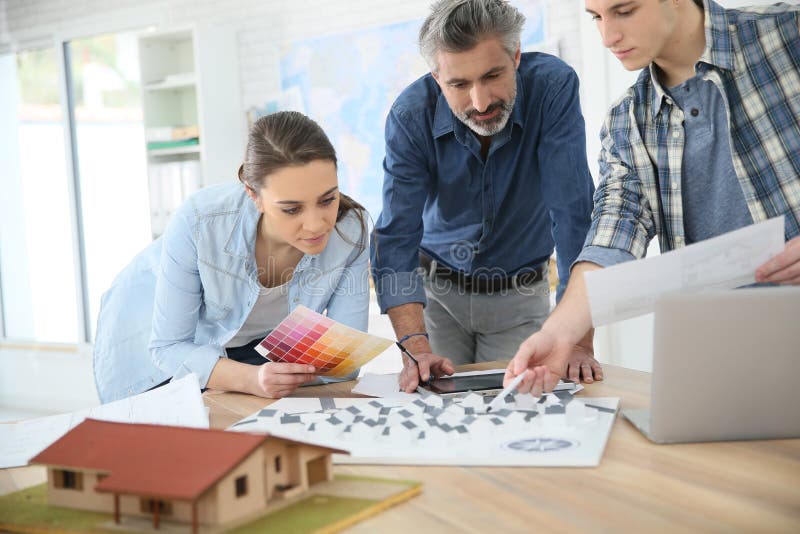 Students with Professor Working on Architecture Project Stock Photo ...