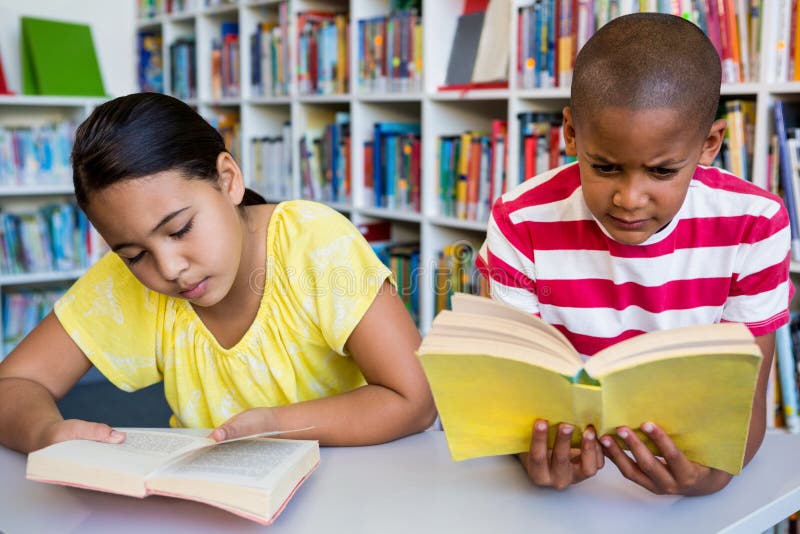 Students Reading Book at Library in School Stock Photo - Image of ...
