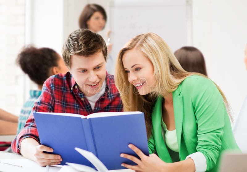 Students Reading Book at School Stock Photo - Image of lecture, reading ...