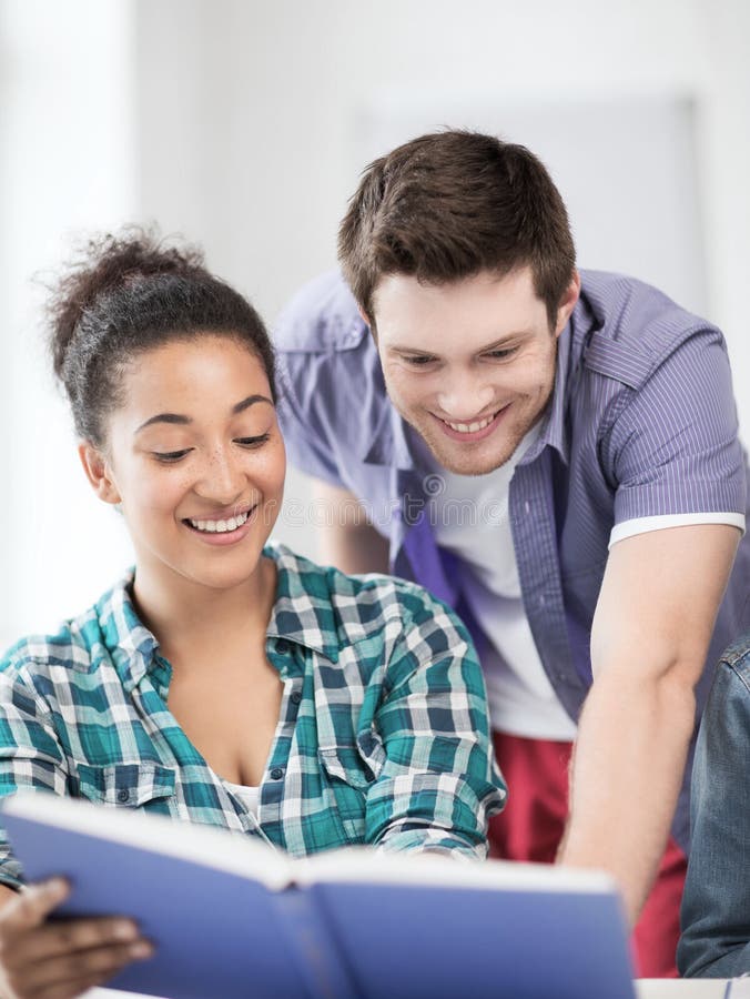 Students Reading Book at School Stock Photo - Image of book, school ...