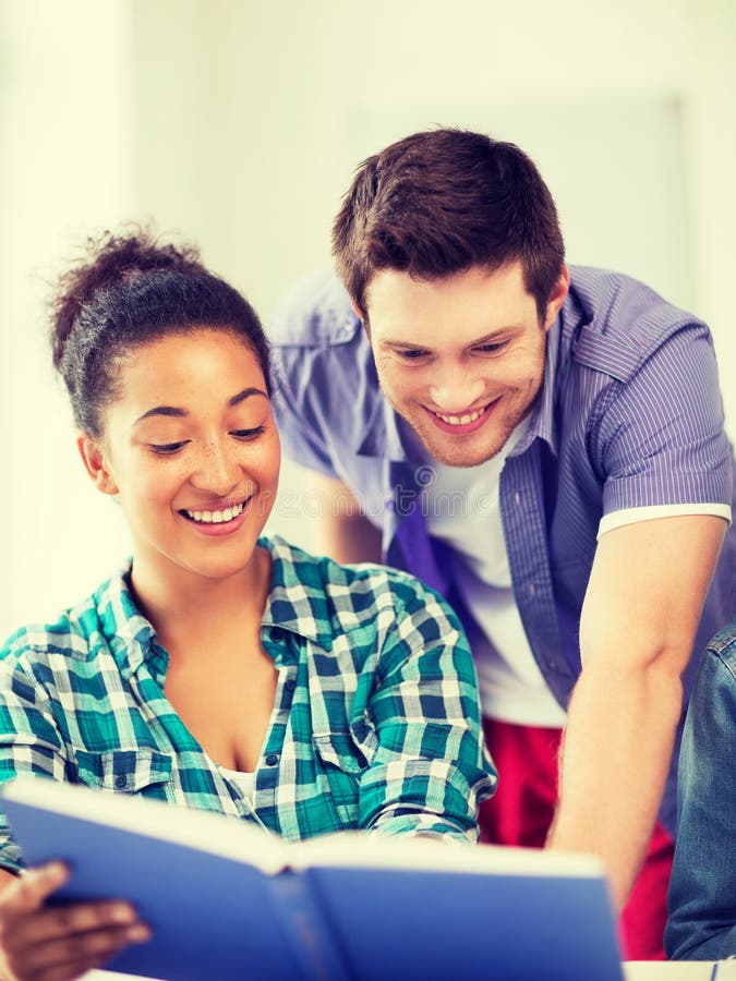 Students Reading Book at School Stock Photo - Image of international ...
