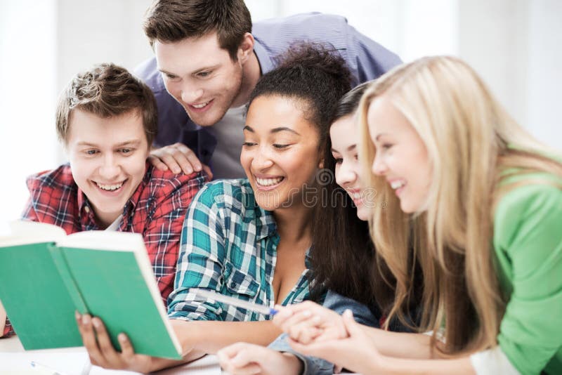 Students Reading Book at School Stock Photo - Image of male, lecture ...