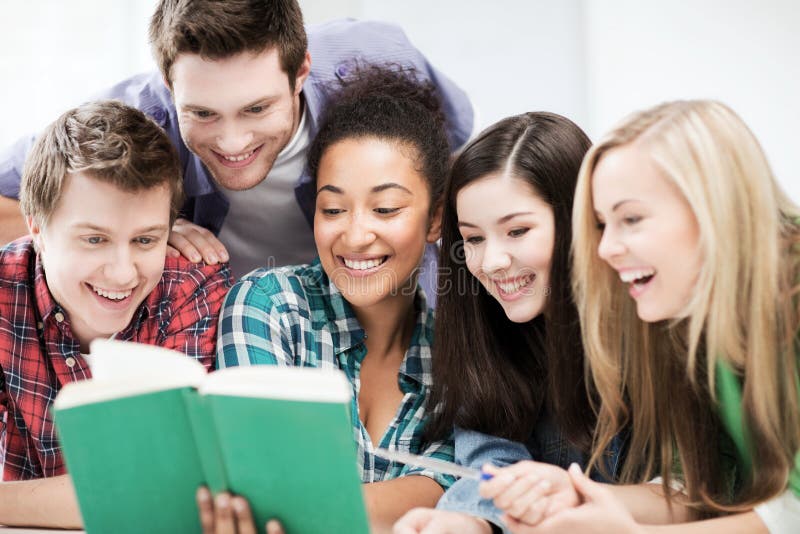 Students Reading Book at School Stock Image - Image of female, laughing ...