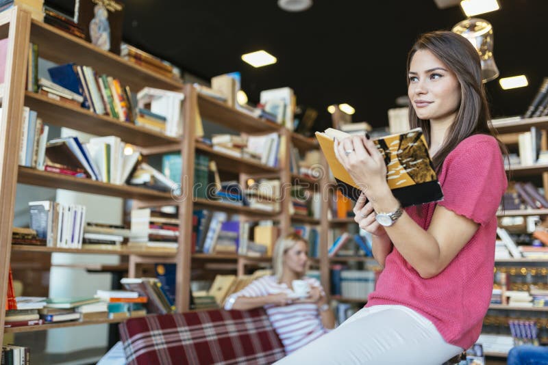 Students Reading Books in Library Stock Image - Image of cafe, pretty ...