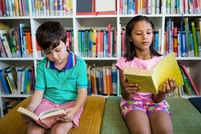 Students Reading Books in School Library Stock Photo - Image of ...