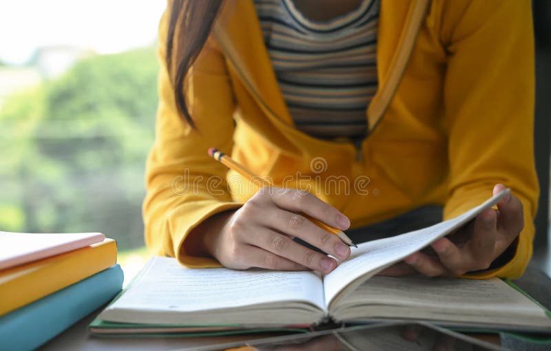Students are Reading Books and Taking Notes for Exam Preparation Stock ...