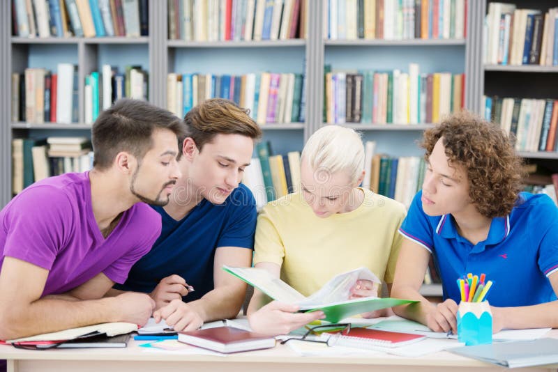 Students Reading New Information in Classroom Stock Image - Image of ...