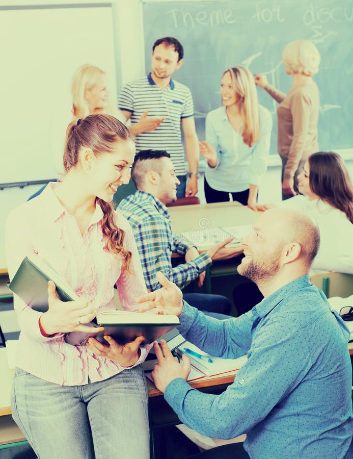 Students Relaxing during a Break Stock Photo - Image of casual ...