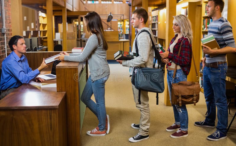 Students in a Row at the Library Counter Stock Image - Image of indoors ...