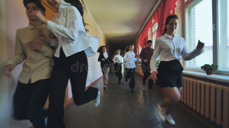 The Students are Running Down the Hallway of the School. Stock Image ...