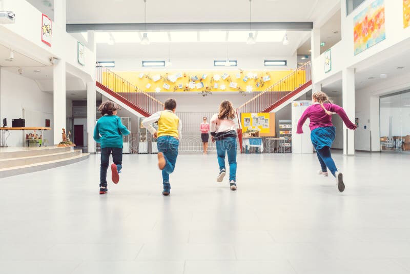 Students Running To Their Classes in School Main Hall Stock Photo ...