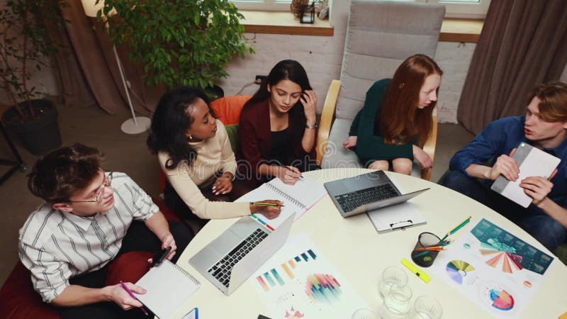 Students of Same Faculty Meeting in Library and Studying Together ...