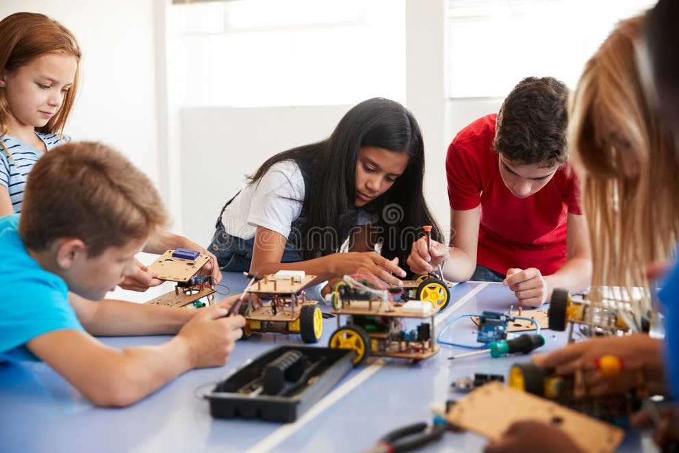 Students in after School Computer Coding Class Building and Learning To ...