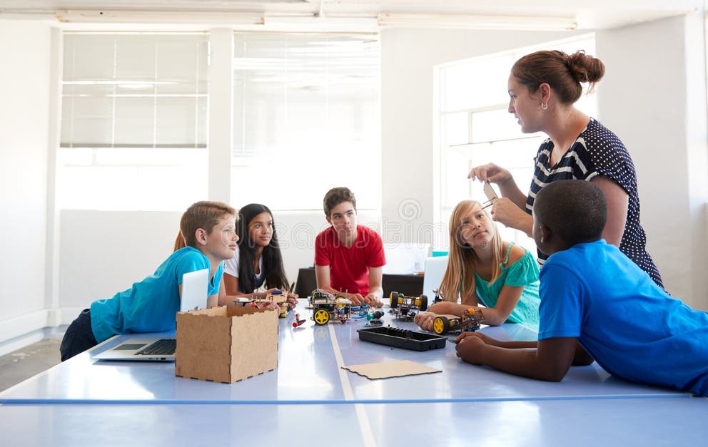 Students in after School Computer Coding Class Building and Learning To ...
