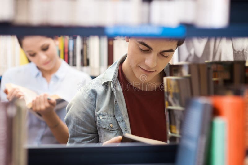Students Searching for Books at the Library Stock Photo - Image of book ...