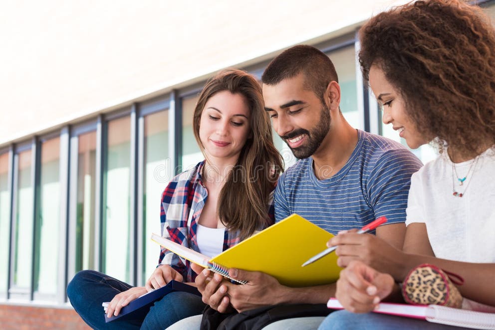 Students sharing notes stock photo. Image of campus, ethnic - 56738180